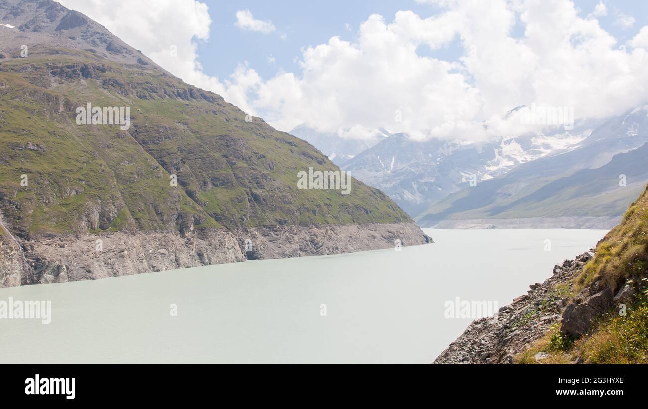 The green waters of Lake Dix - Dam Grand Dixence - Switzerland Stock ...