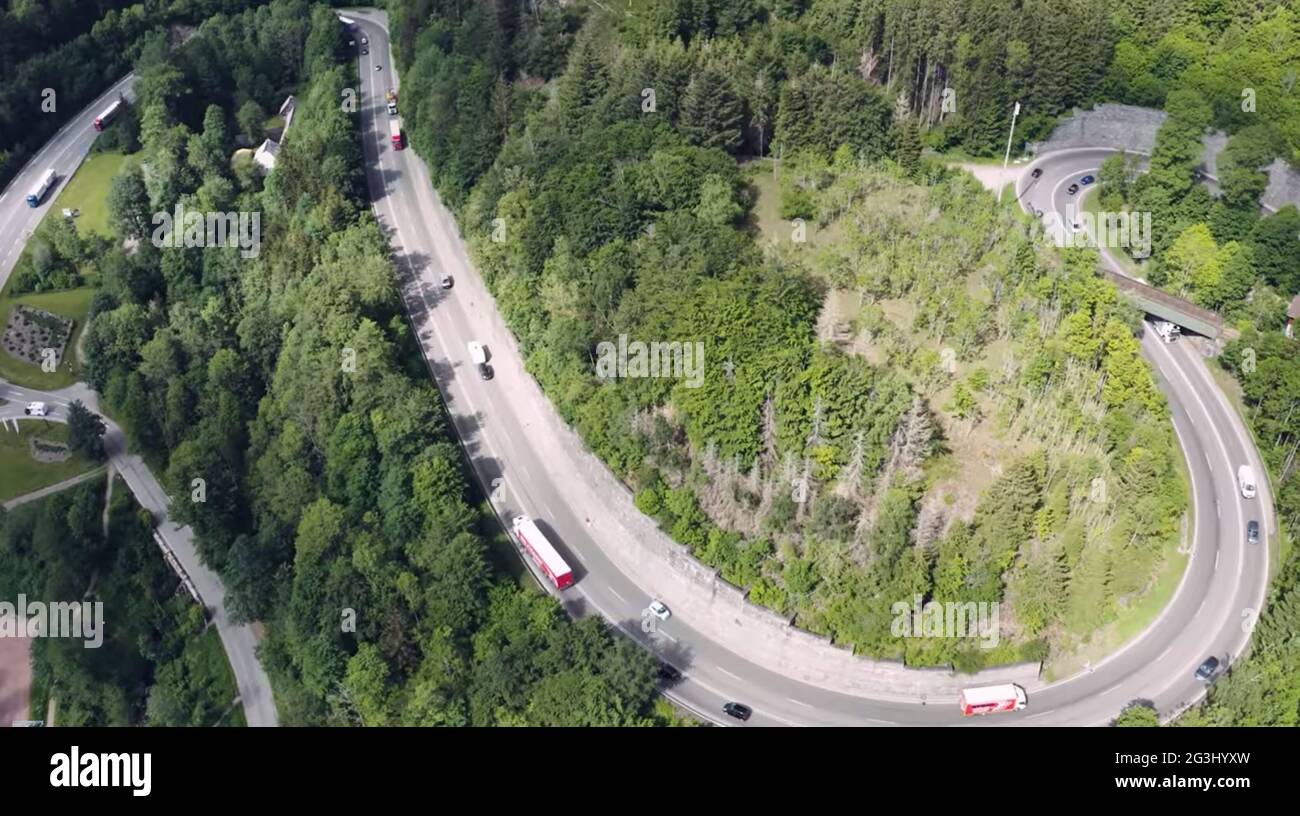 Beautiful road turn in forest and hills natural view Stock Photo - Alamy