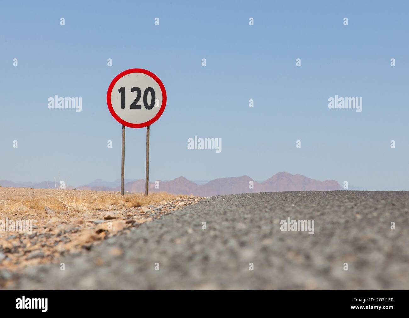 Speed limit sign at a desert road in Namibia Stock Photo - Alamy