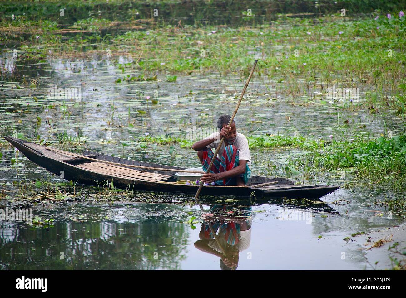 The boatman with boat Stock Photo - Alamy