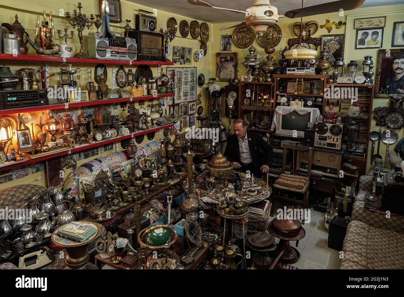 16 June 2021, Iraq, Mosul: Iraqi Fakhri Suleiman Al-Tai sits at his ...