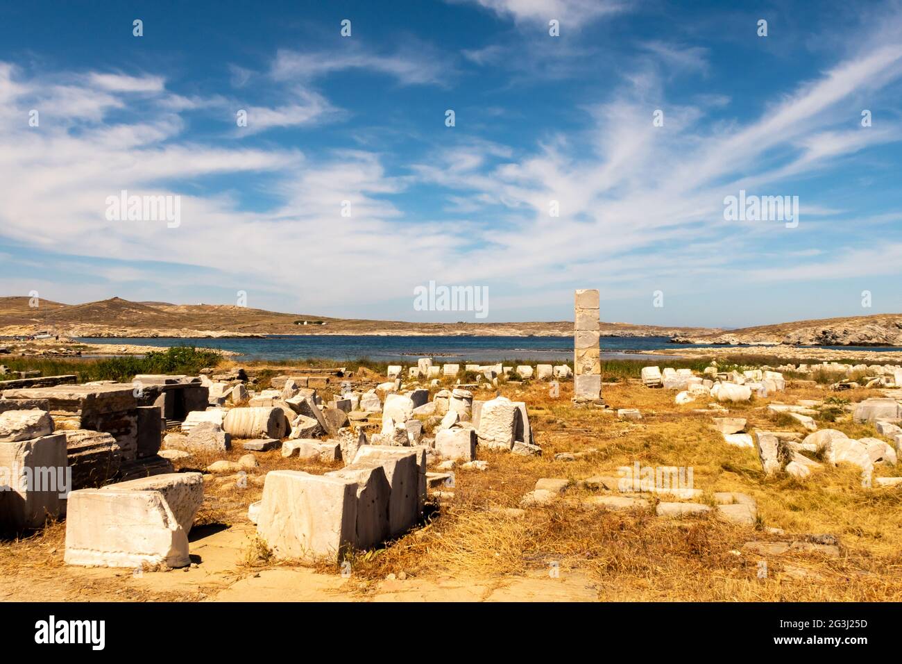Ruins of an ancient city with stones, columns and temples on DELOS ...
