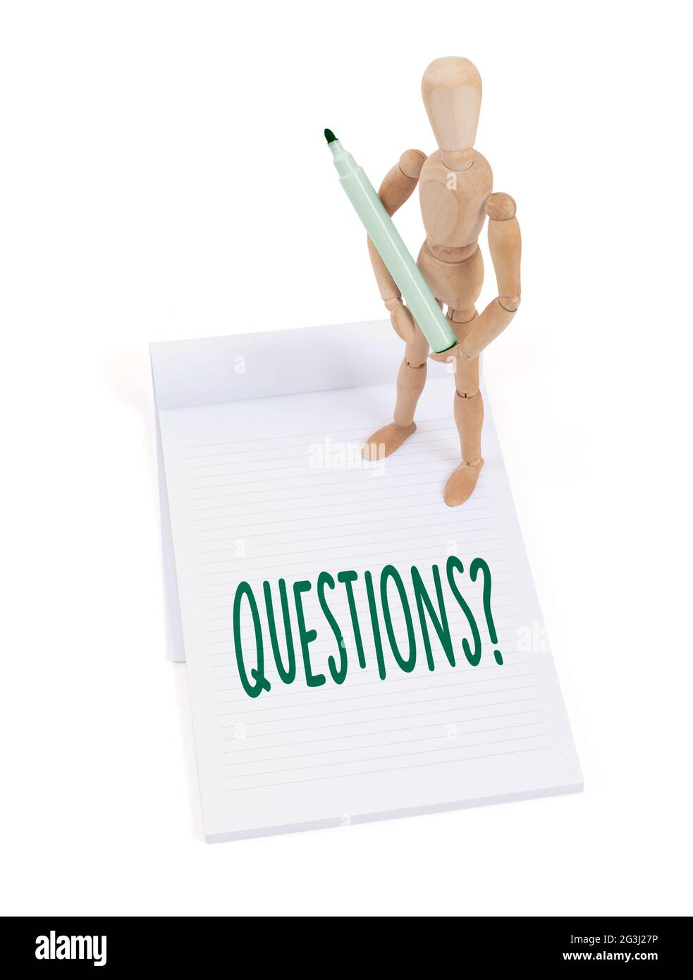 Wooden mannequin writing - Questions Stock Photo - Alamy