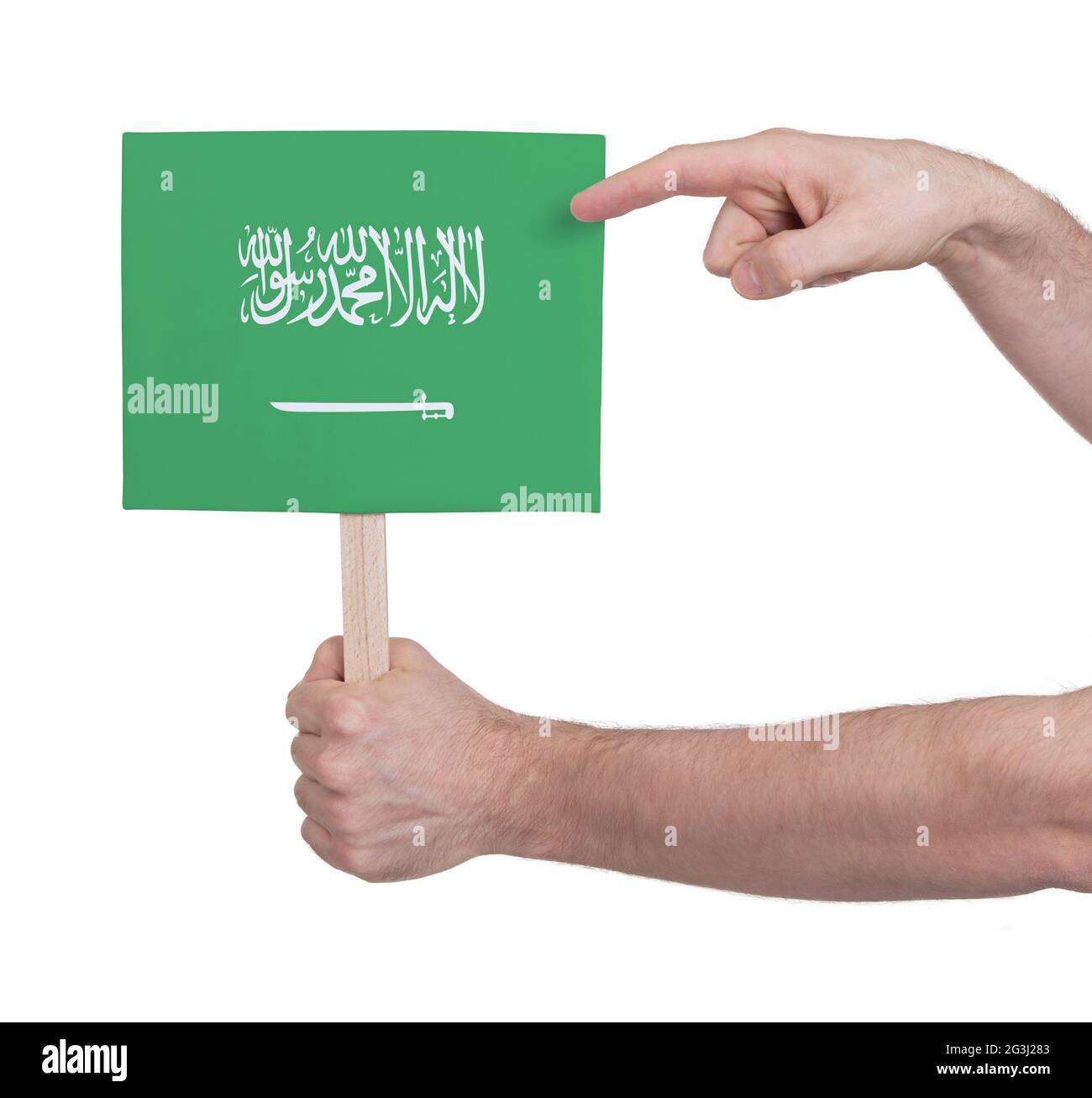 Hand holding small card - Flag of Saudi Arabia Stock Photo - Alamy