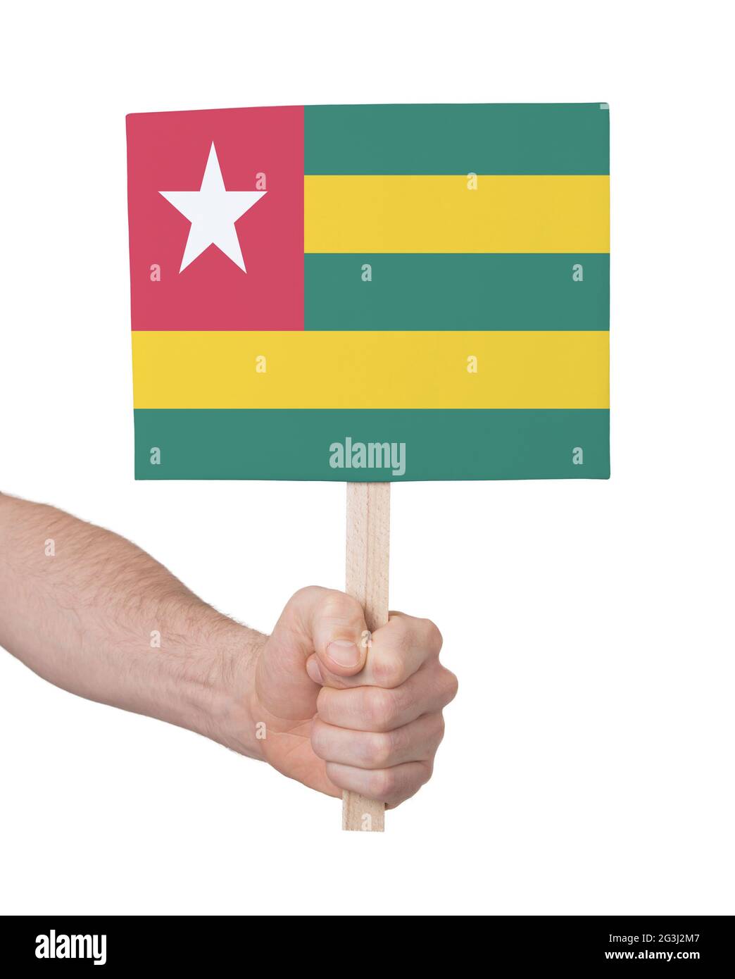 Hand holding small card - Flag of Togo Stock Photo - Alamy