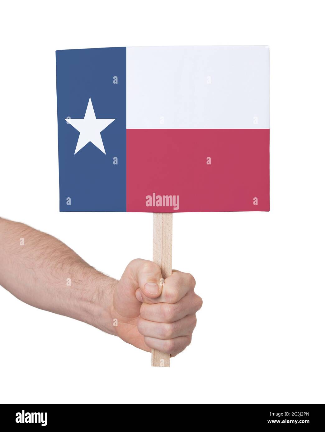 Hand holding small card - Flag of Texas Stock Photo - Alamy