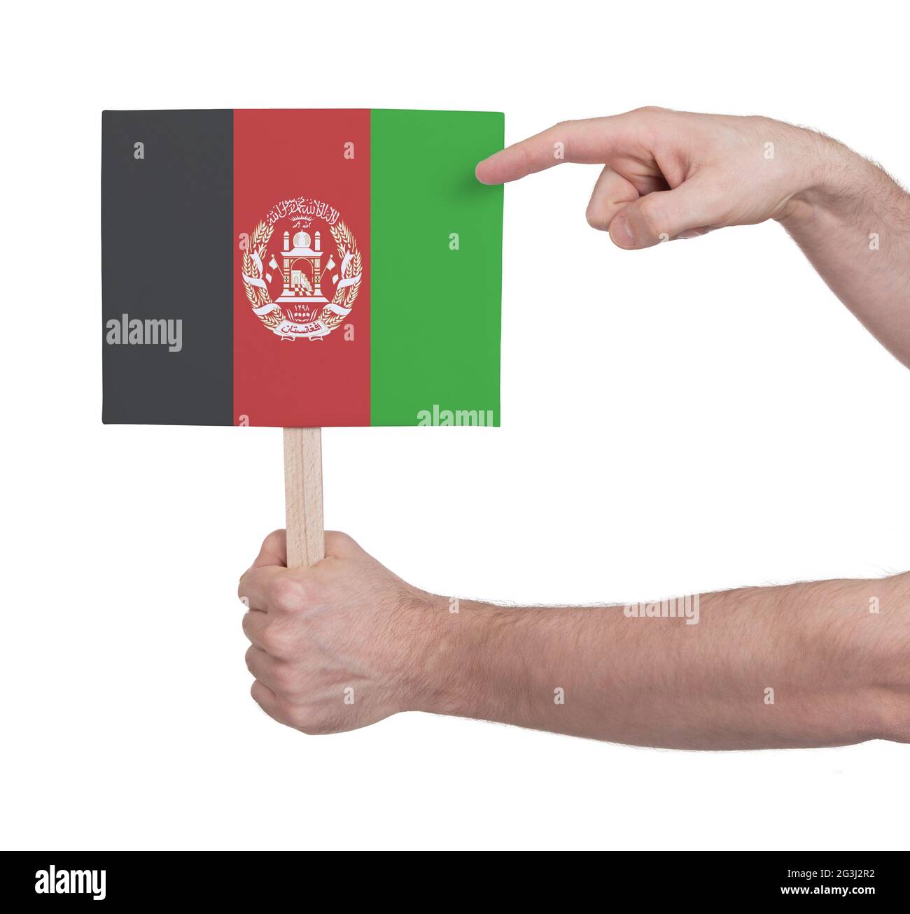 Hand holding small card - Flag of Afghanistan Stock Photo - Alamy