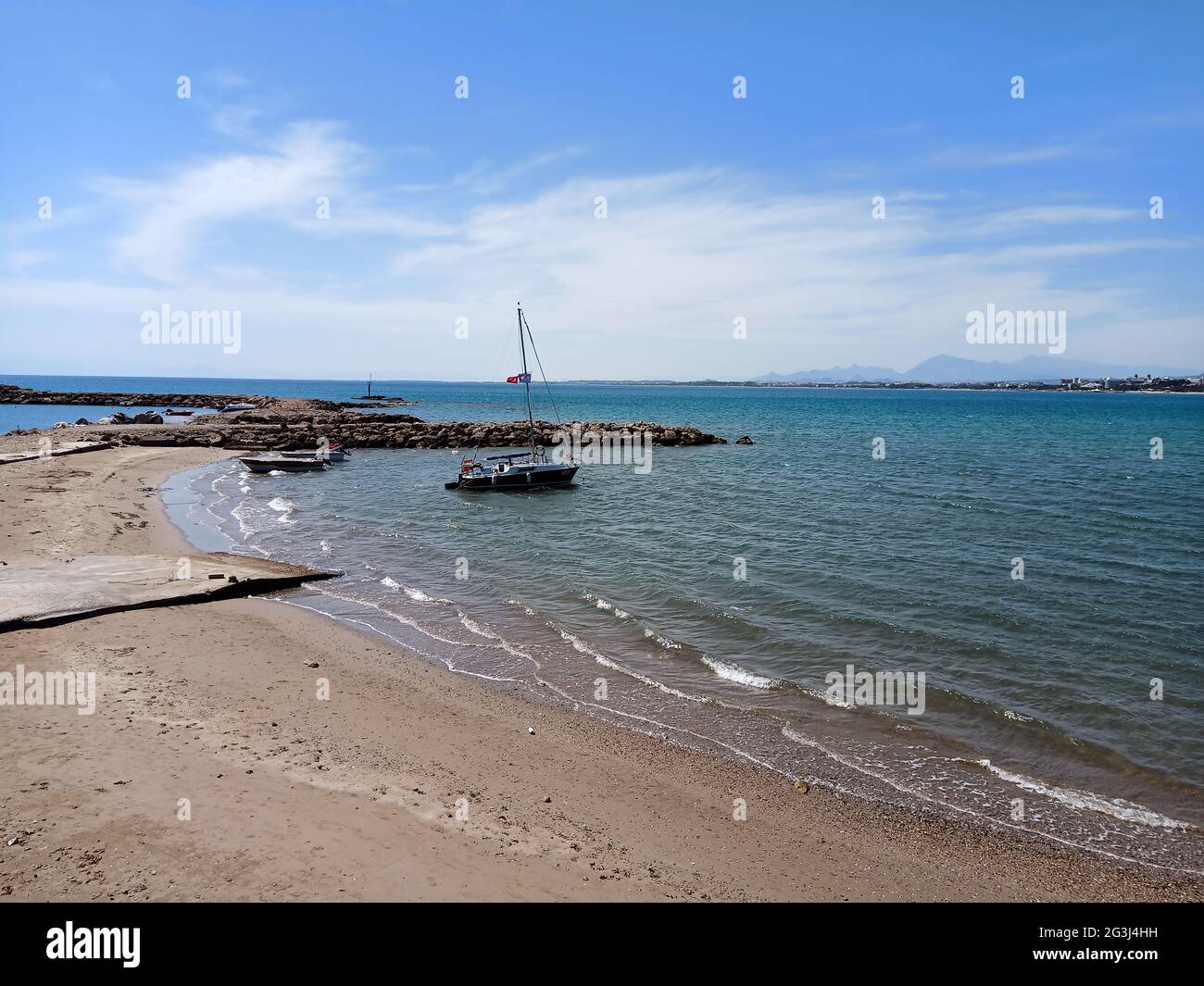 Natural view of shallow-water waves under a clear blue sky during ...