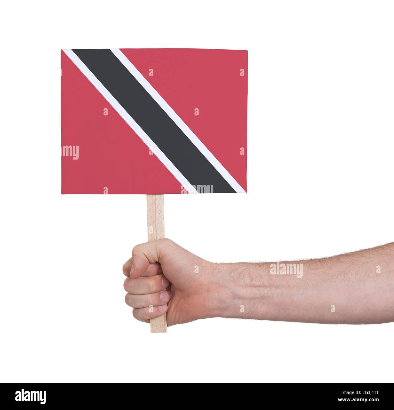 Hand holding small card - Flag of Trinidad and Tobago Stock Photo - Alamy