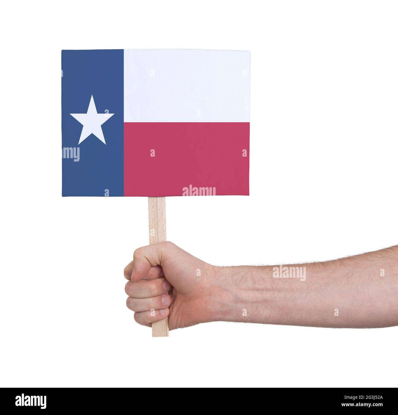 Hand holding small card - Flag of Texas Stock Photo - Alamy