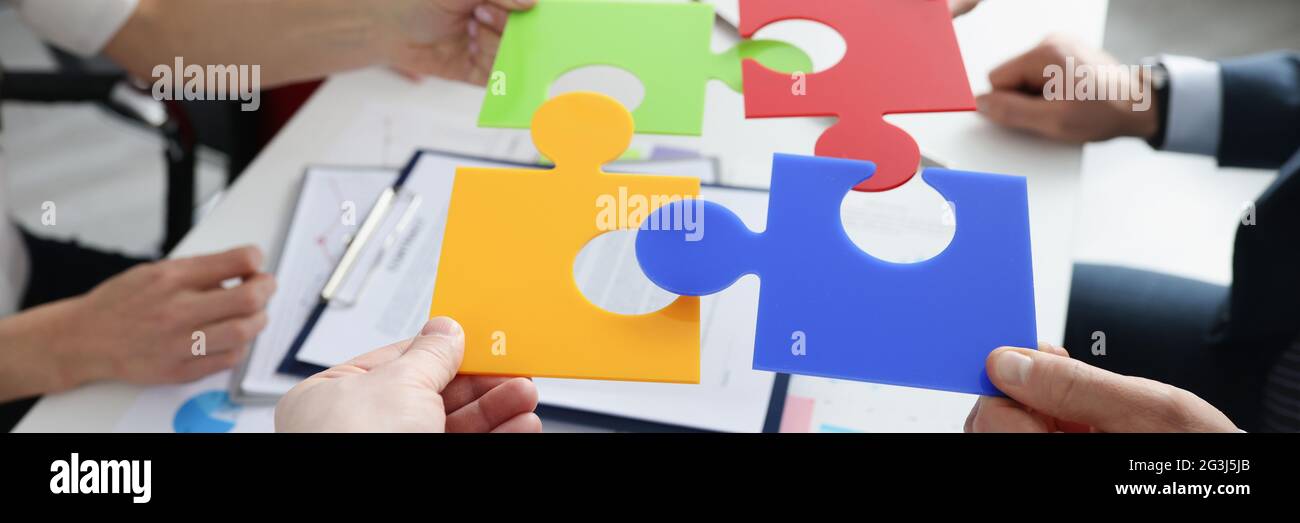 Team work puzzles hi-res stock photography and images - Alamy