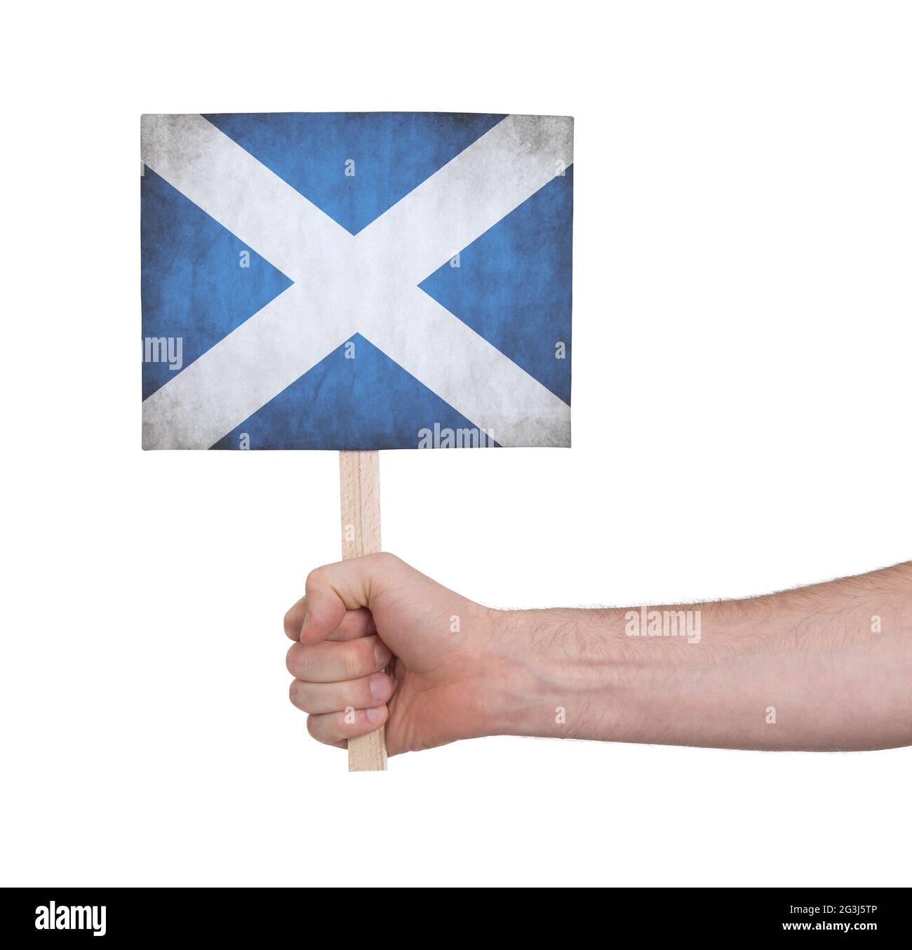Hand holding small card - Flag of Scotland Stock Photo - Alamy