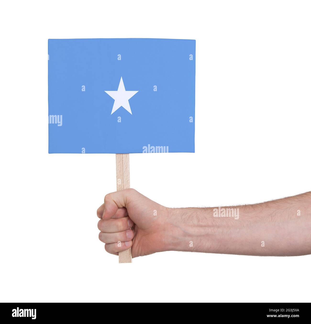 Hand holding small card - Flag of Somalia Stock Photo - Alamy