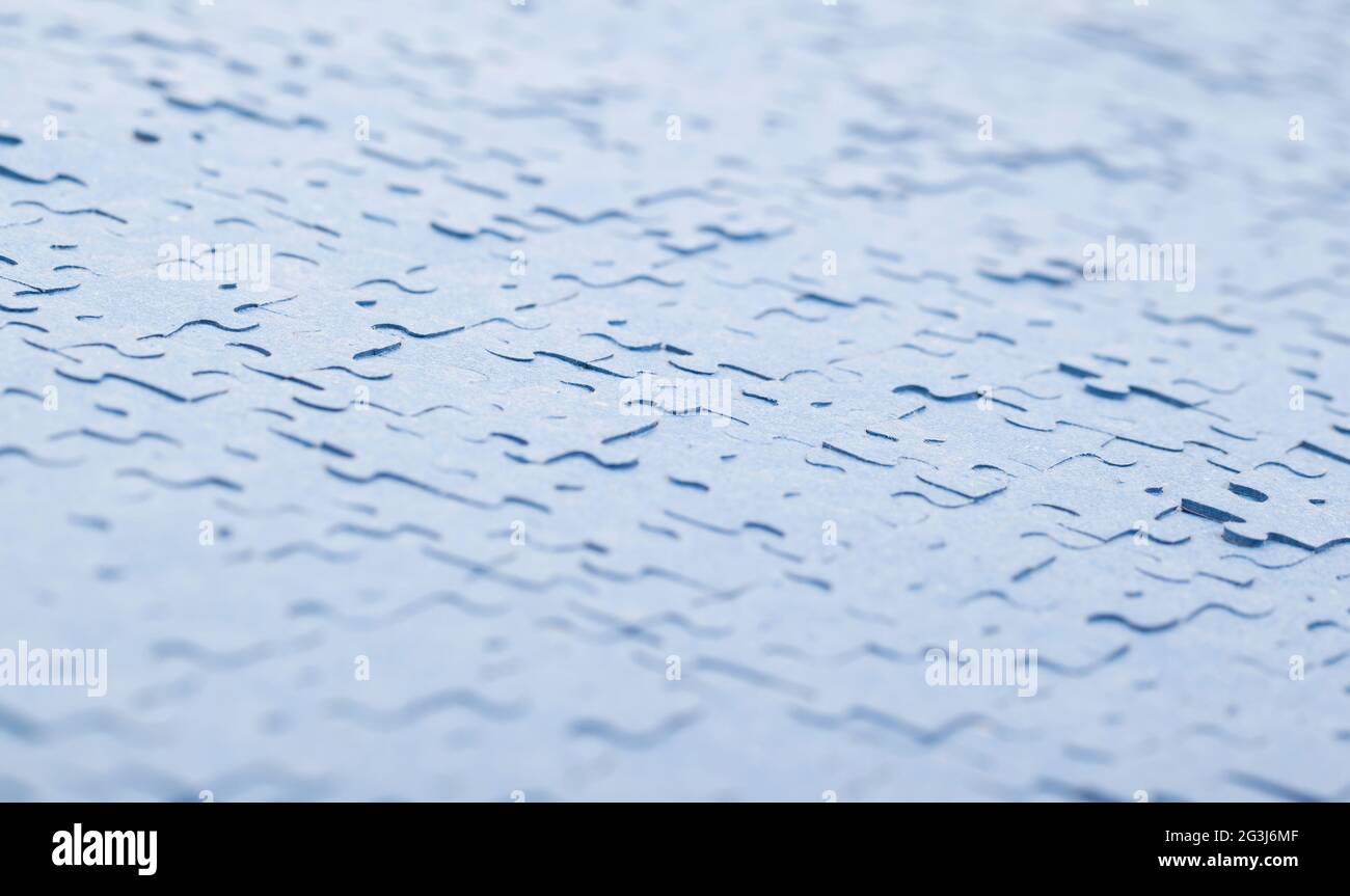 Connected blue puzzle pieces isolated Stock Photo - Alamy