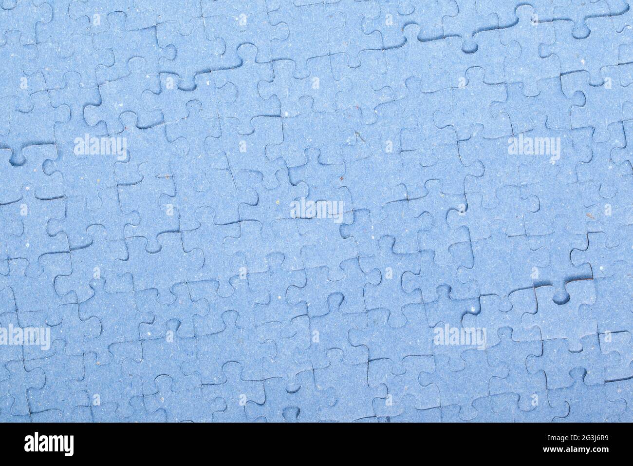 Connected blue puzzle pieces isolated Stock Photo - Alamy