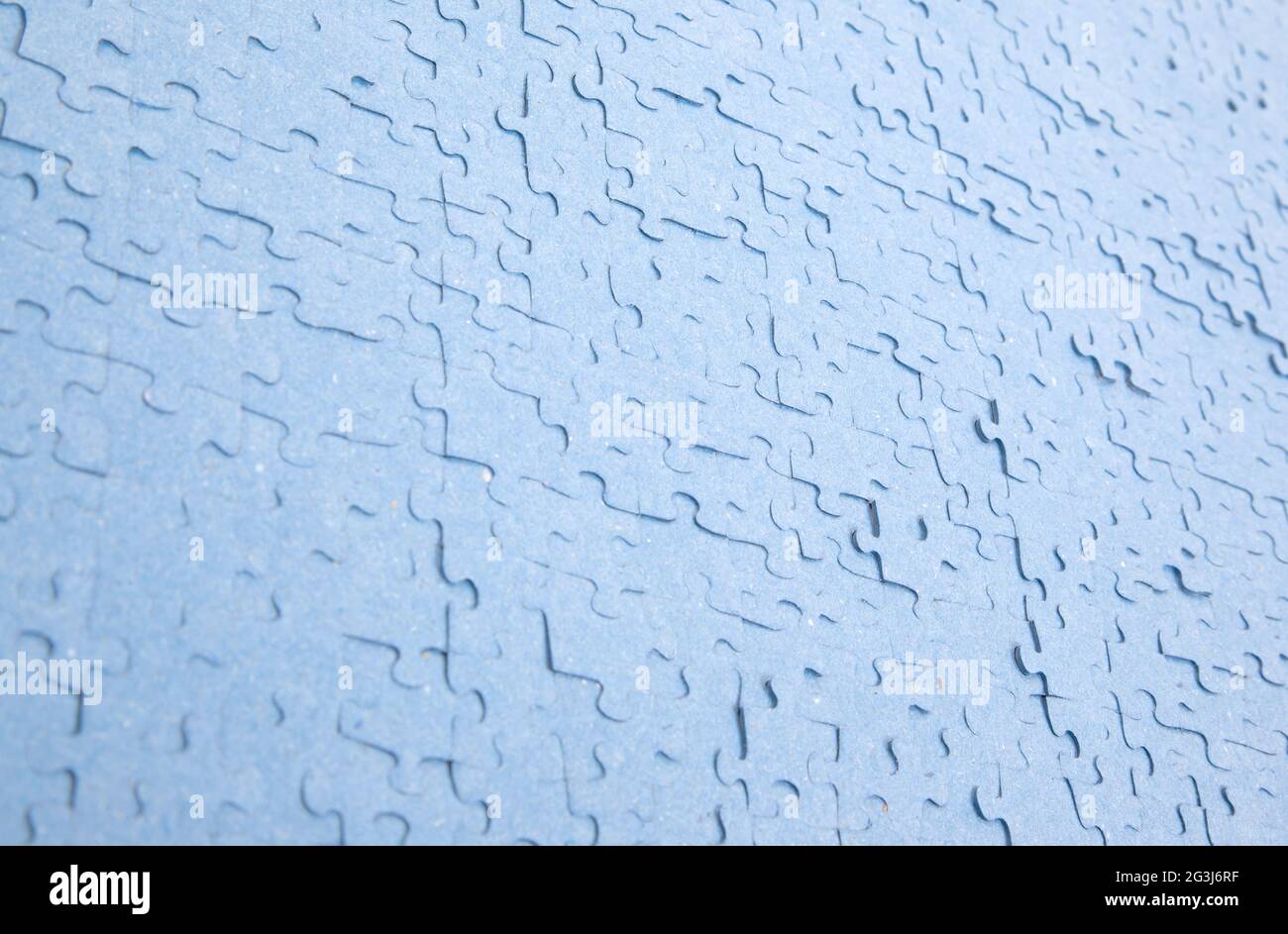 Connected blue puzzle pieces isolated Stock Photo - Alamy