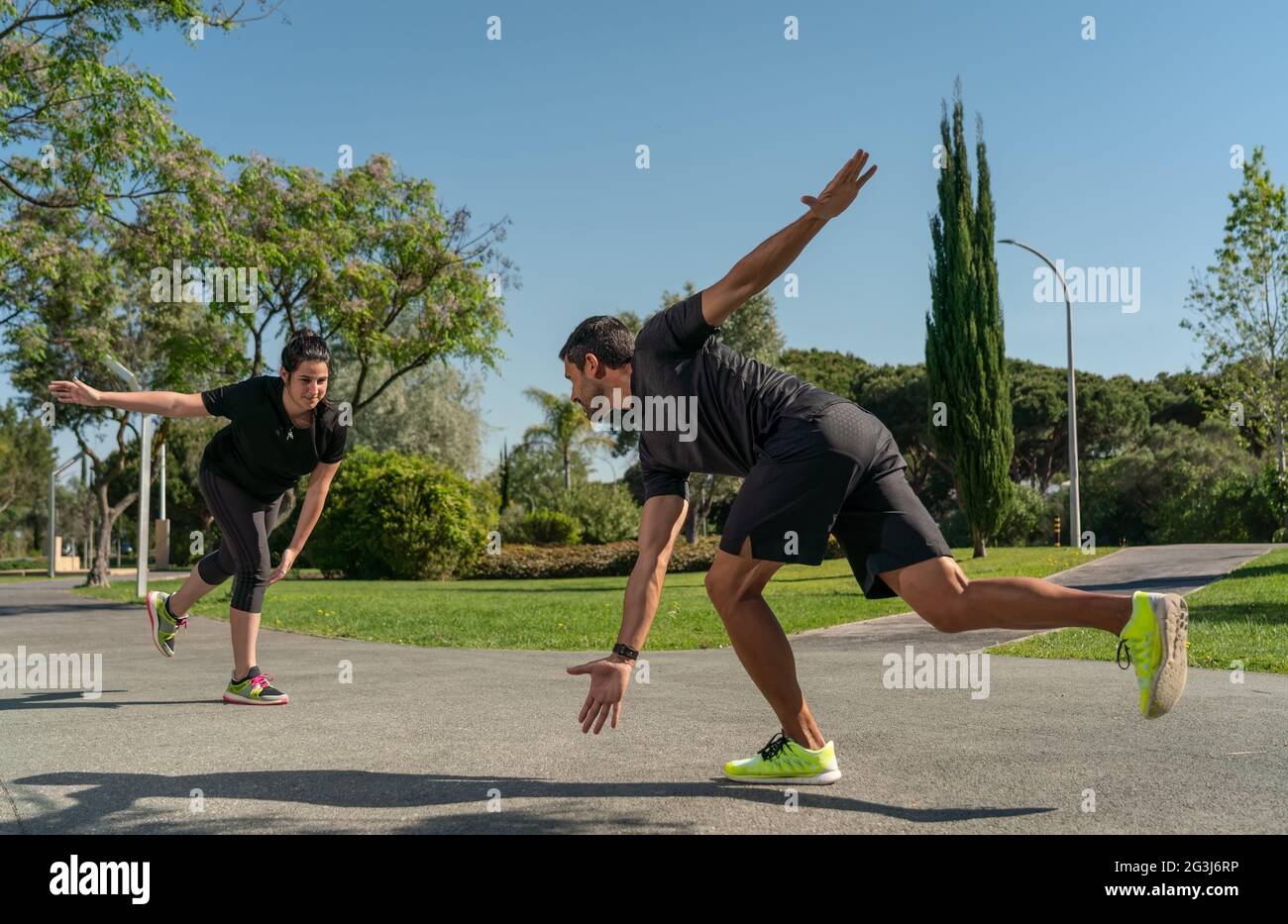 Personal fitness trainer for functional training, coaches a client for ...