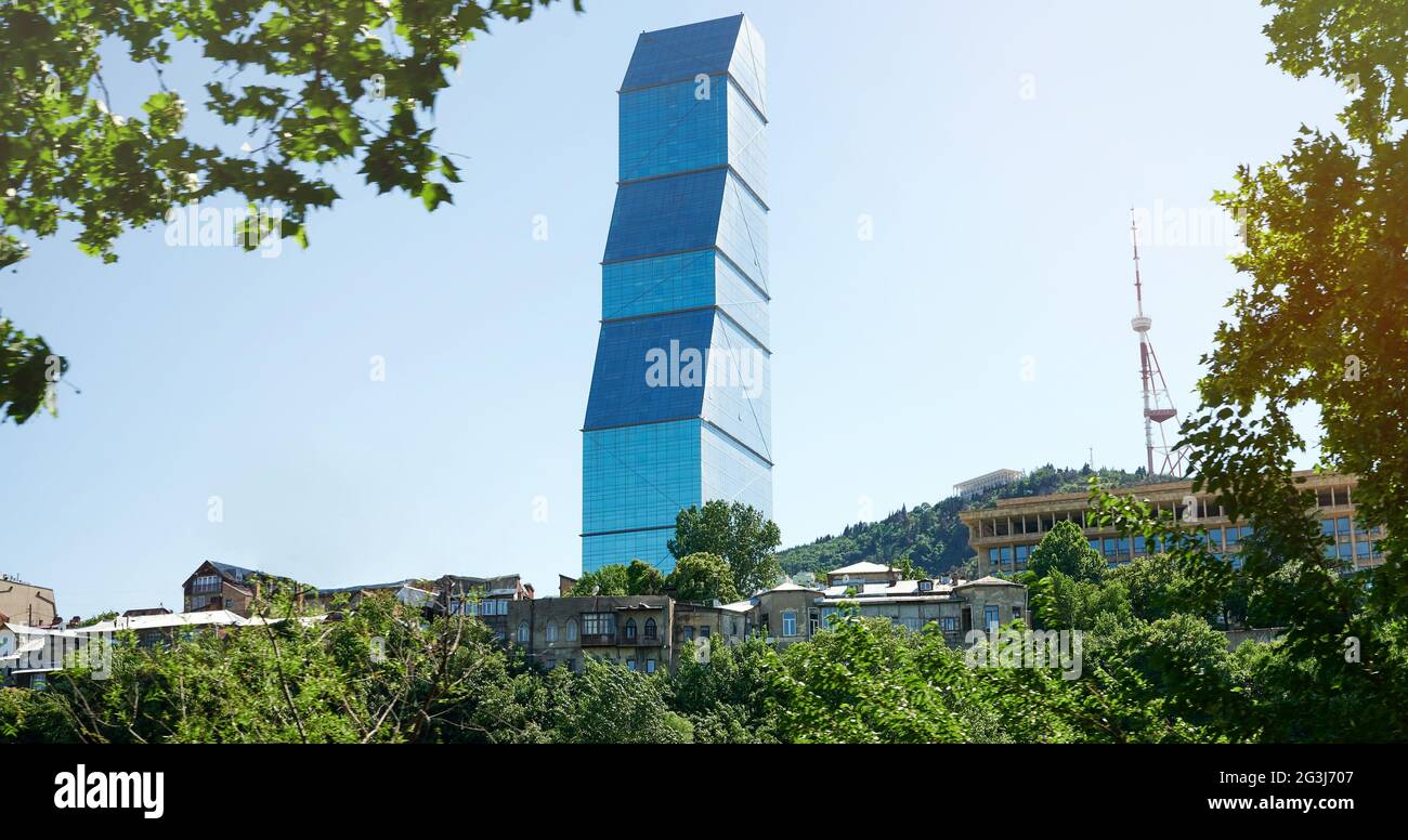 Skyscraper in Tbilisi on leaf frame with old buildings background Stock ...