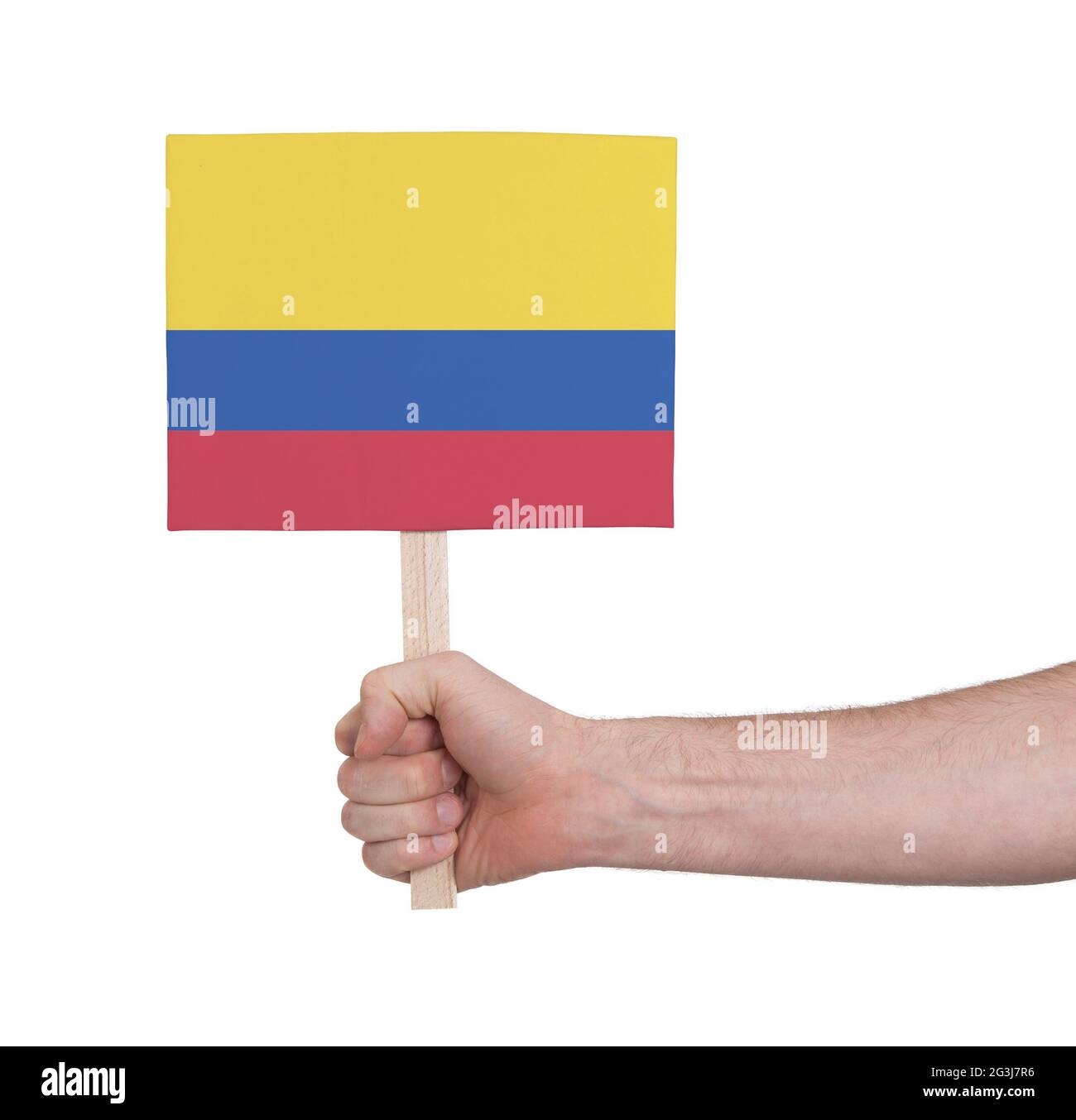 Hand holding small card - Flag of Colombia Stock Photo - Alamy