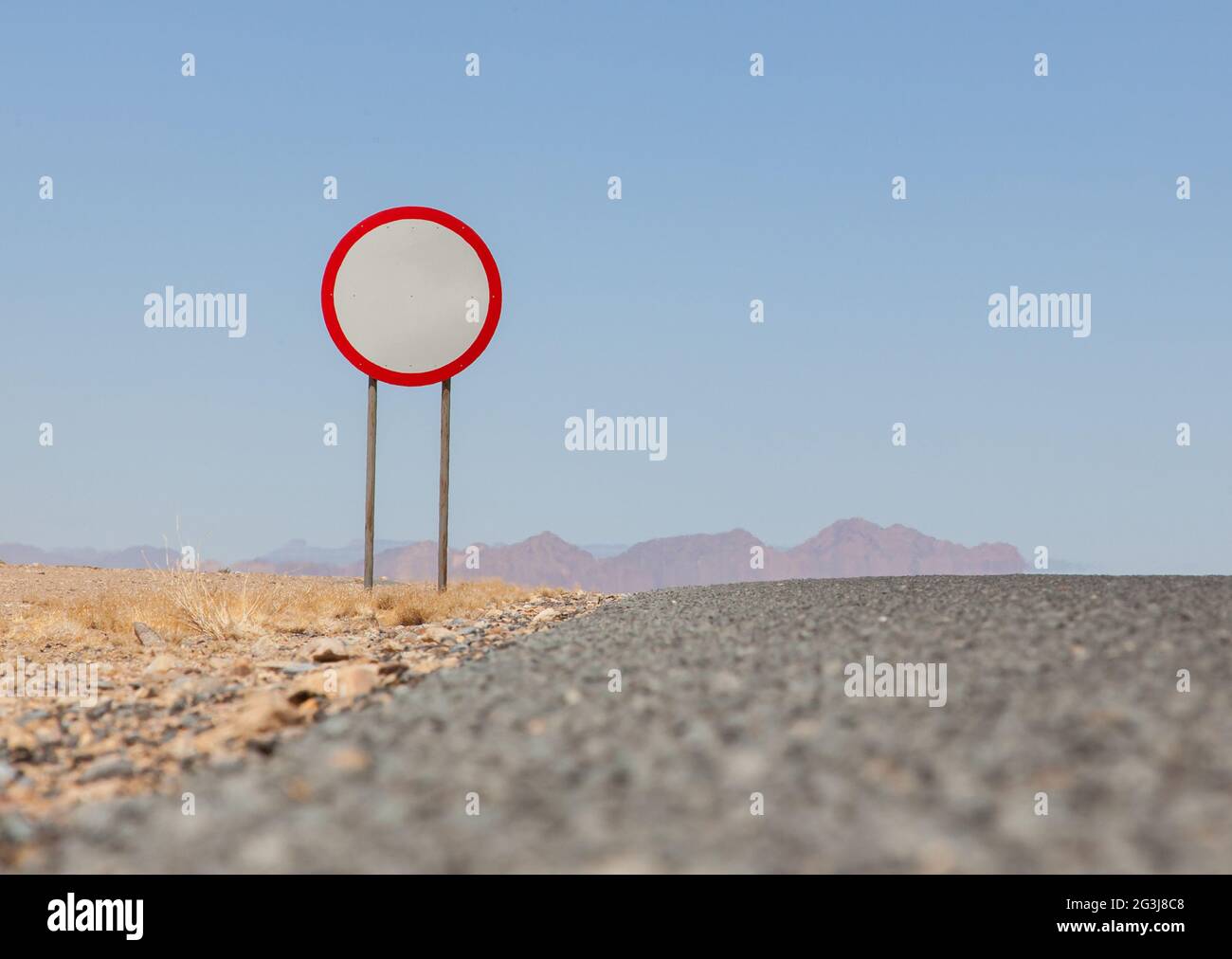 Speed limit sign at a desert road Stock Photo - Alamy