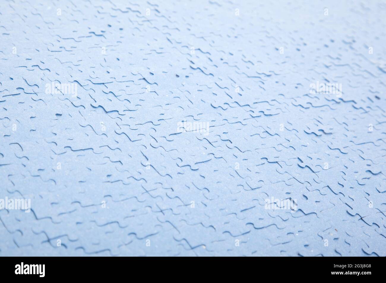 Connected blue puzzle pieces isolated Stock Photo - Alamy