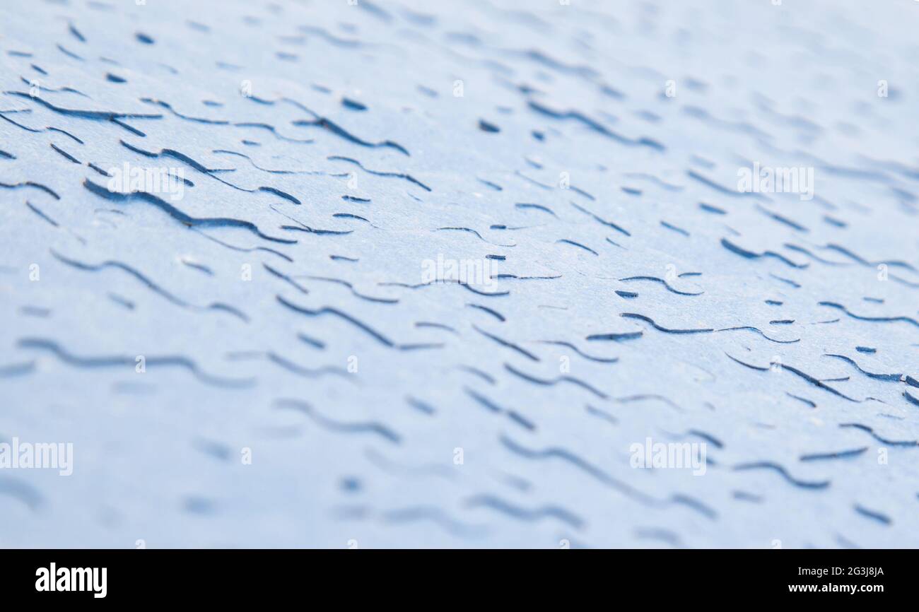 Connected blue puzzle pieces isolated Stock Photo - Alamy