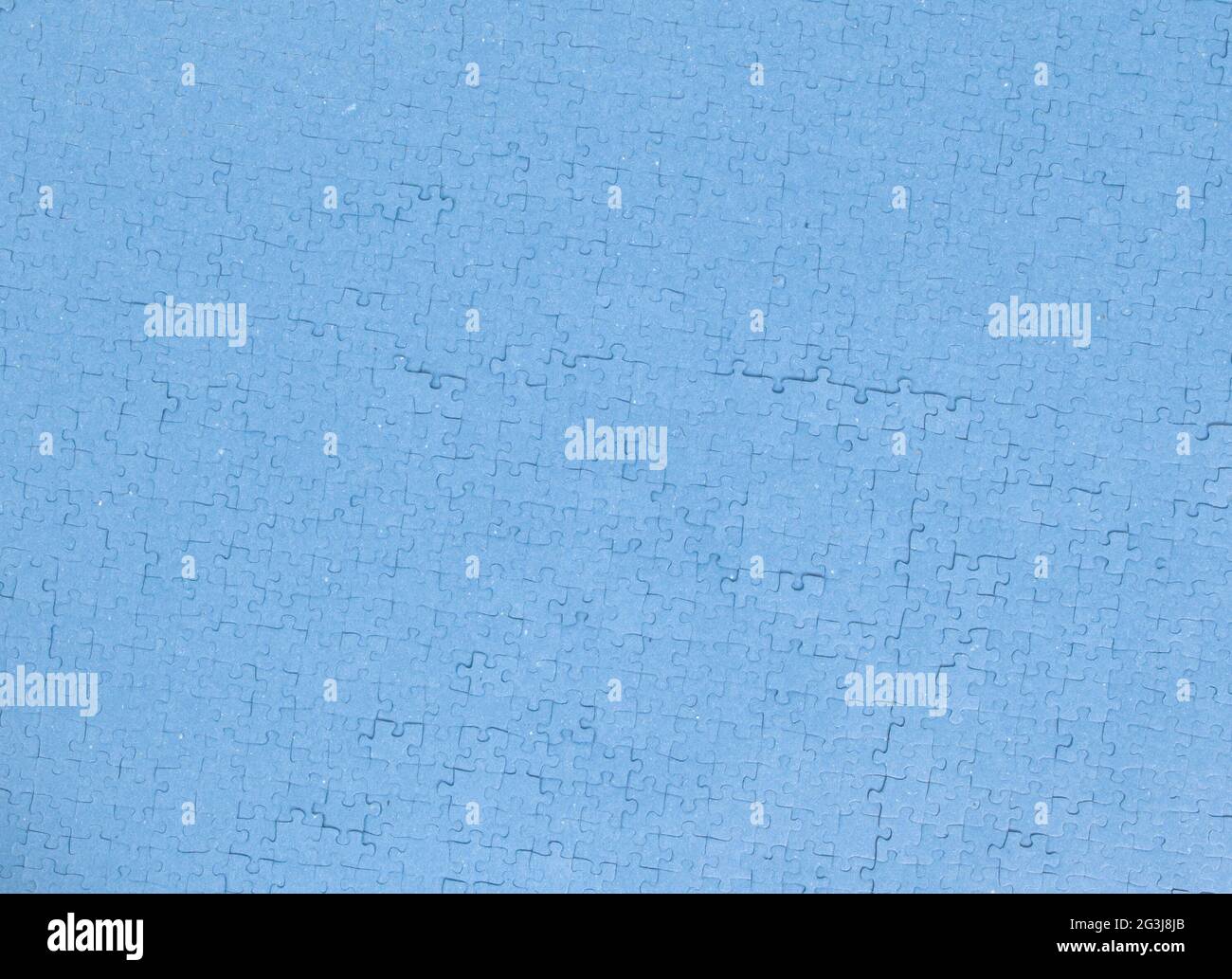 Connected blue puzzle pieces isolated Stock Photo - Alamy