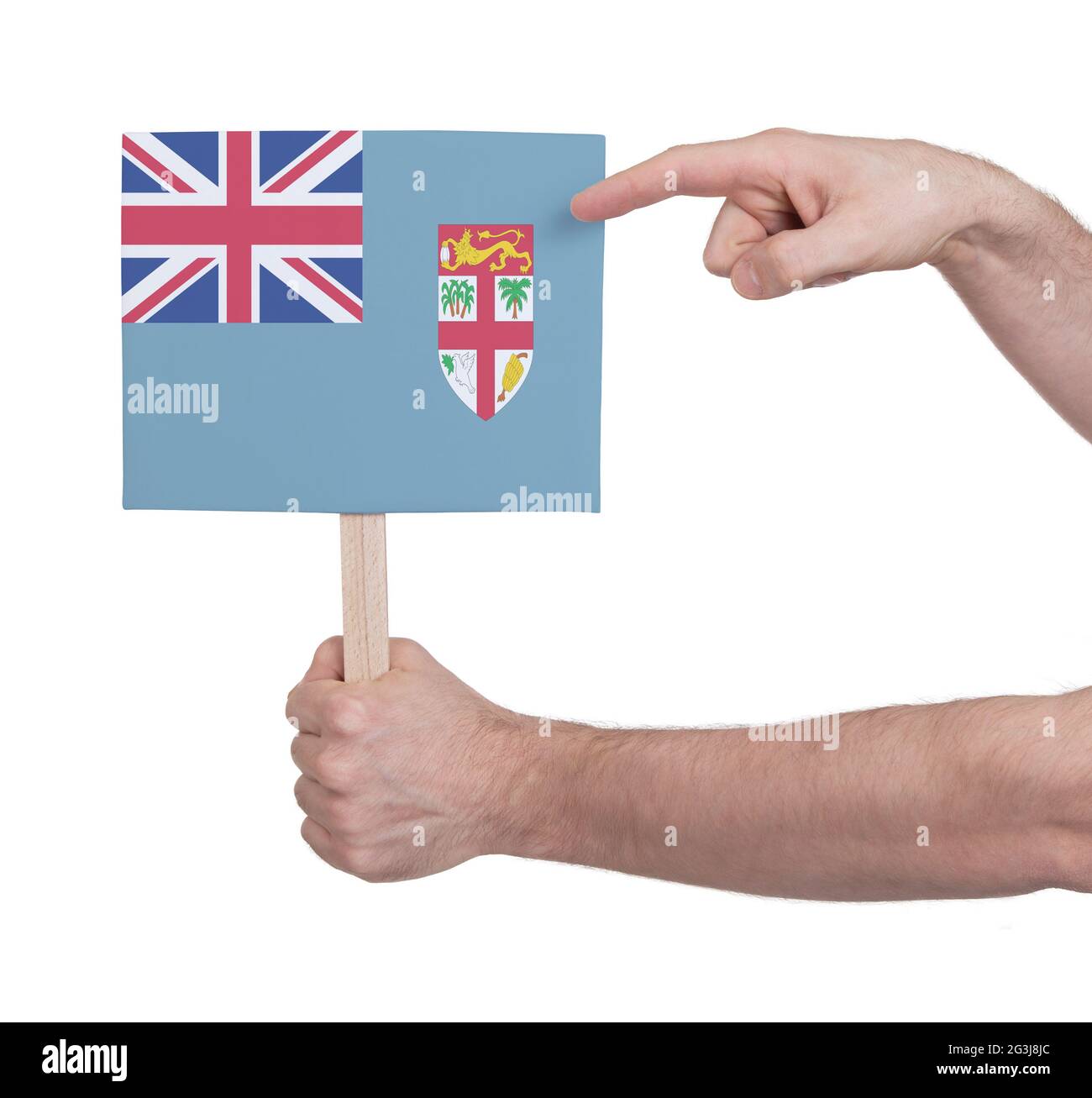 Hand holding small card - Flag of Fiji Stock Photo - Alamy