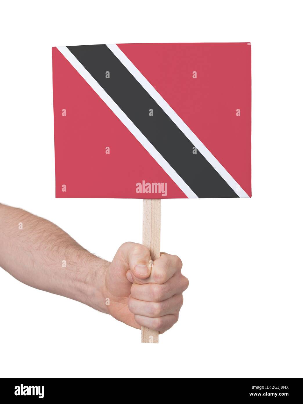 Hand holding small card - Flag of Trinidad and Tobago Stock Photo - Alamy