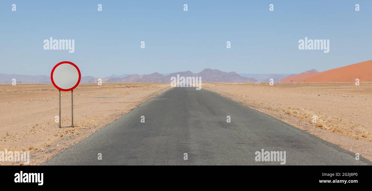 Speed limit sign at a desert road Stock Photo - Alamy