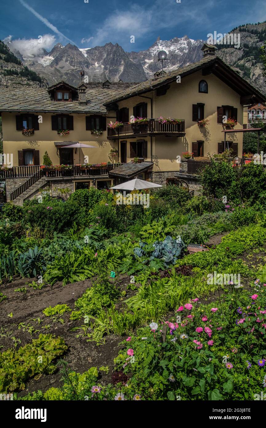 Italian alps flowery village Stock Photo - Alamy
