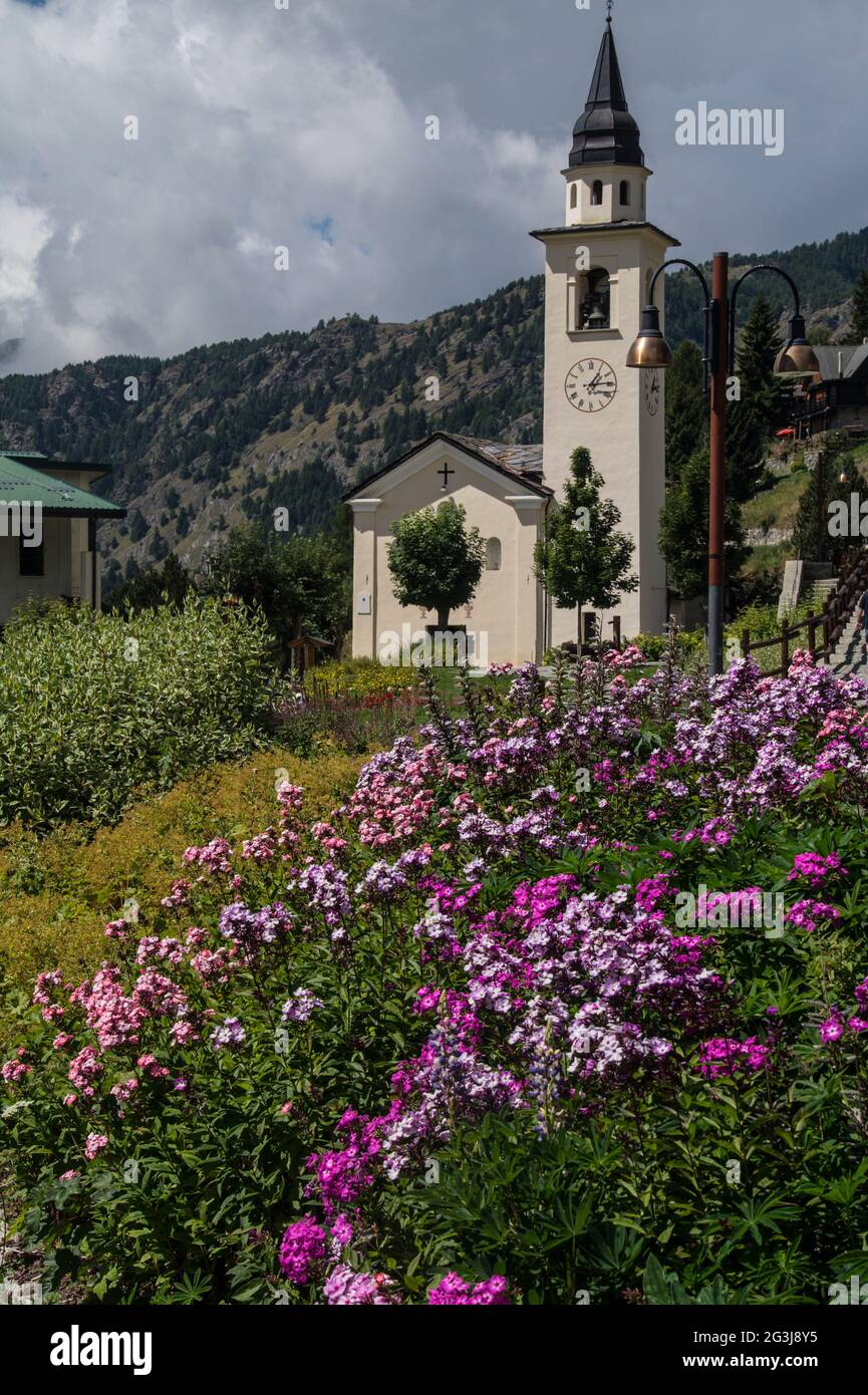 Italian alps flowery village Stock Photo - Alamy