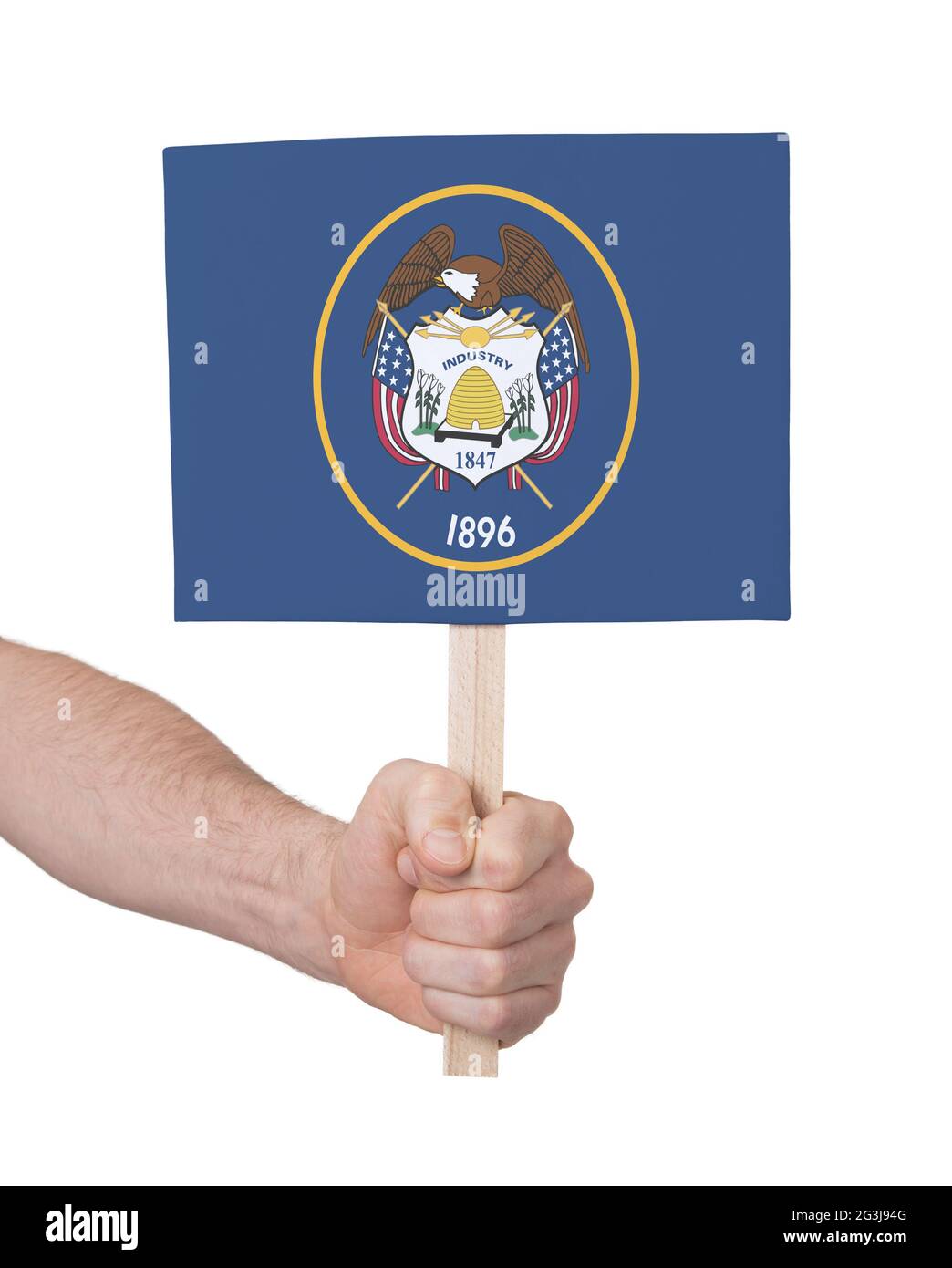 Hand holding small card - Flag of Utah Stock Photo - Alamy