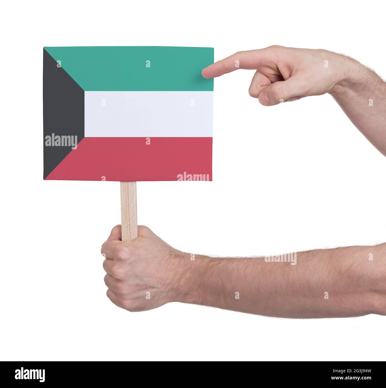Hand holding small card - Flag of Kuwait Stock Photo - Alamy