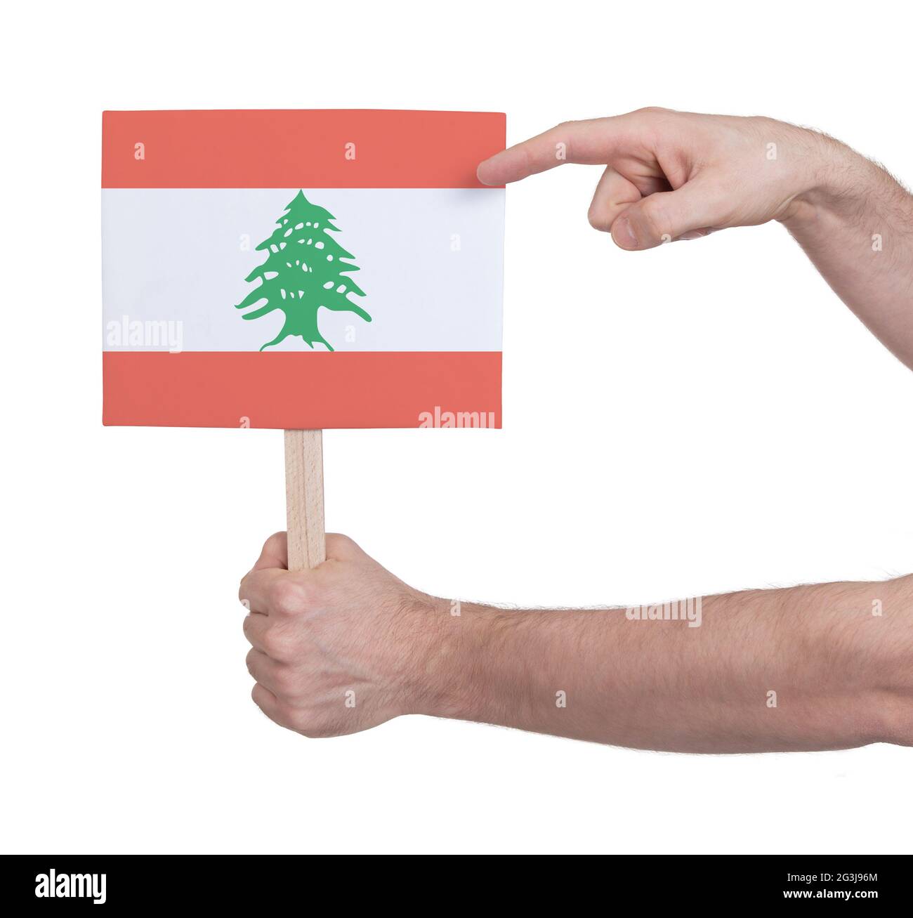 Hand holding small card - Flag of Lebanon Stock Photo - Alamy