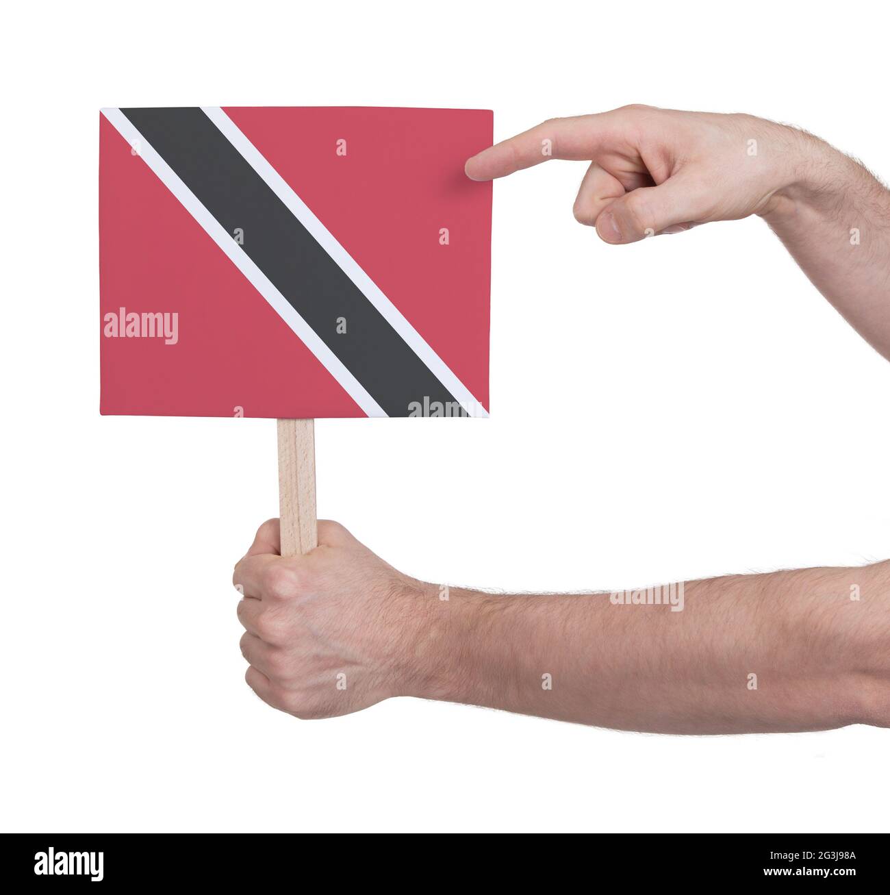 Hand holding small card - Flag of Trinidad and Tobago Stock Photo - Alamy