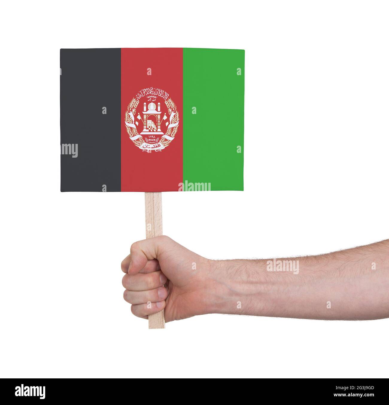 Hand holding small card - Flag of Afghanistan Stock Photo - Alamy