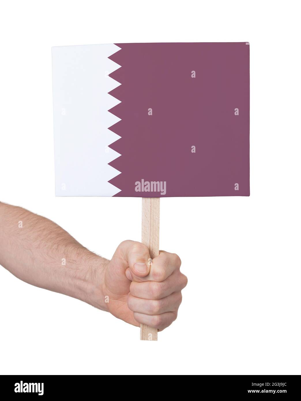 Hand holding flag qatar hi-res stock photography and images - Alamy
