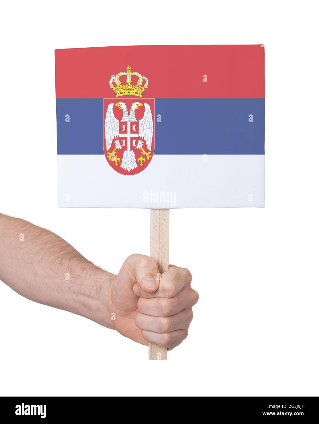 Hand holding small card - Flag of Serbia Stock Photo - Alamy