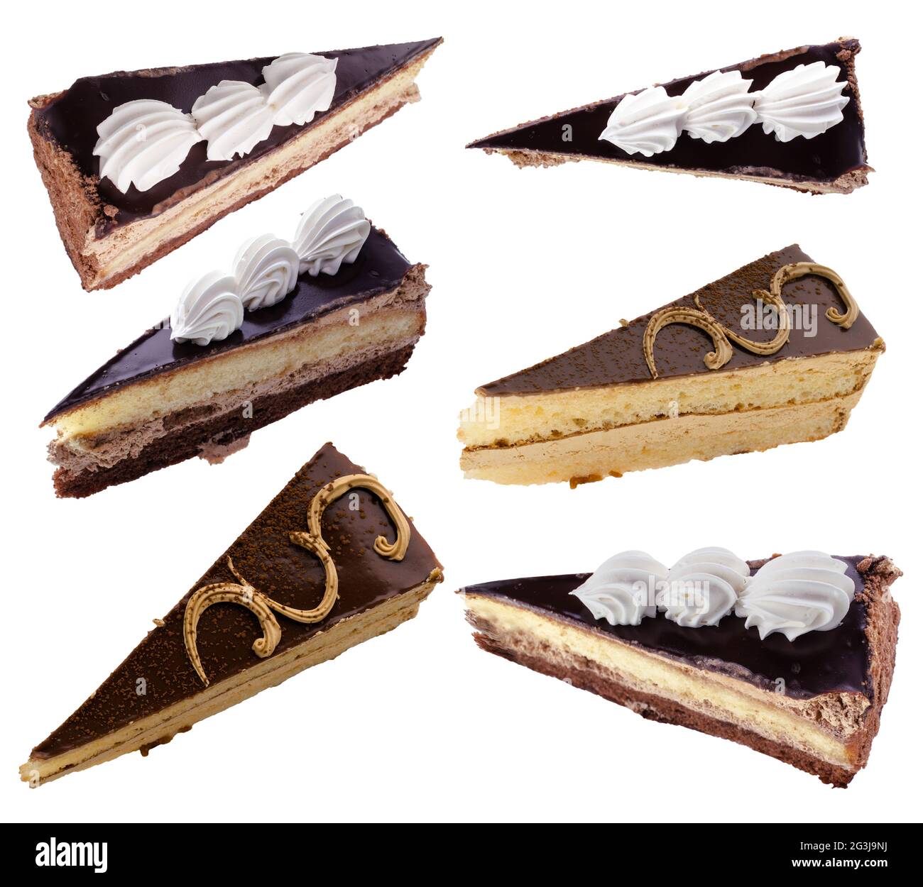 Cut pieces of cake arranged in a chaotic manner on a white background ...