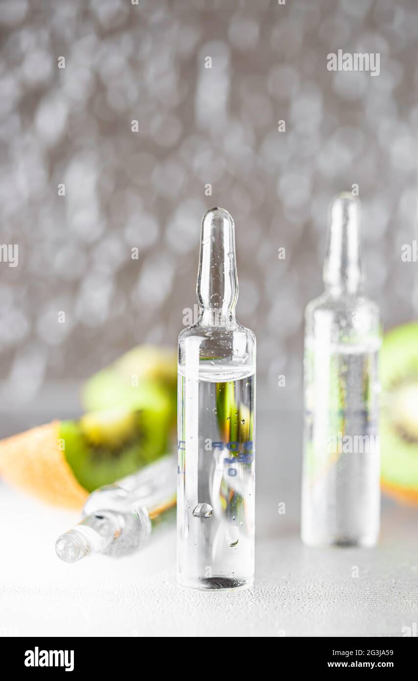 Ampoule with vitamin C for injection. Natural cosmetics concept ...