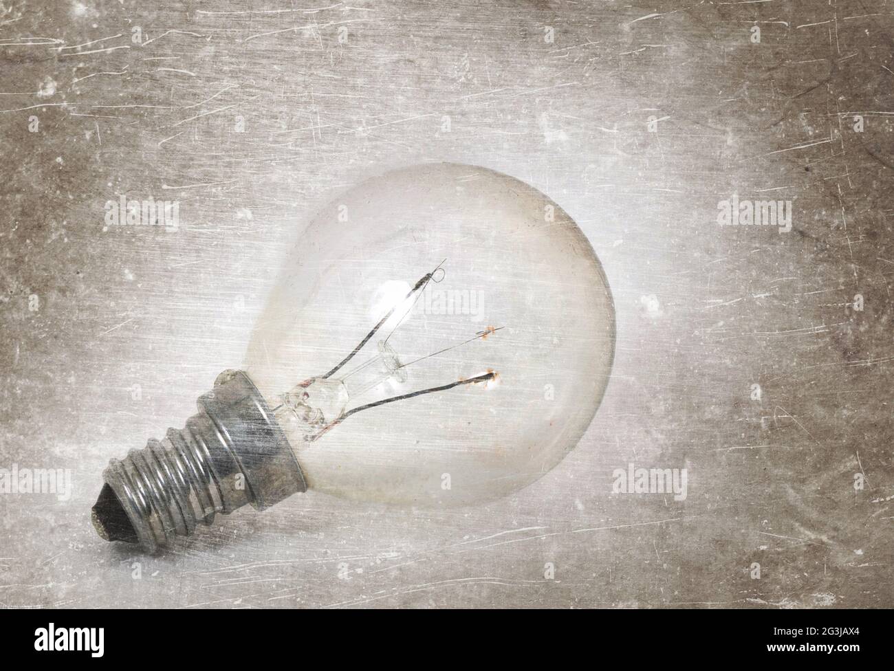 Old lightbulb isolated on a white background Stock Photo - Alamy