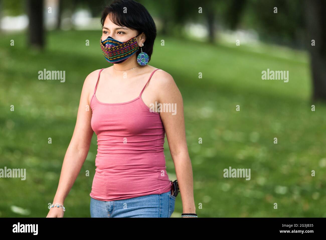 Latin America Bolivian woman with traditional pattern cloth mask ...