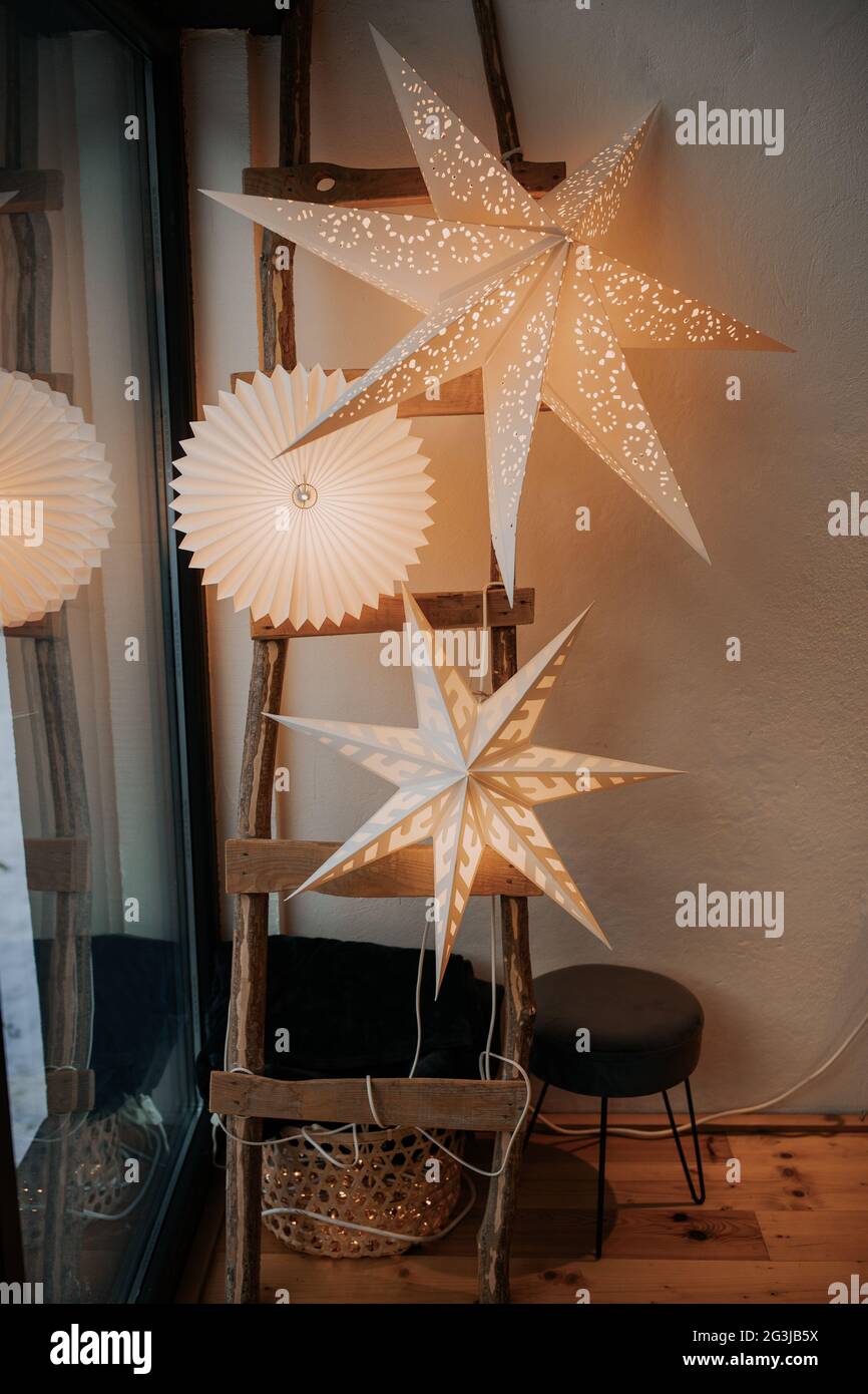 Vertical shot of decorative illuminated star-shaped lamps Stock Photo ...