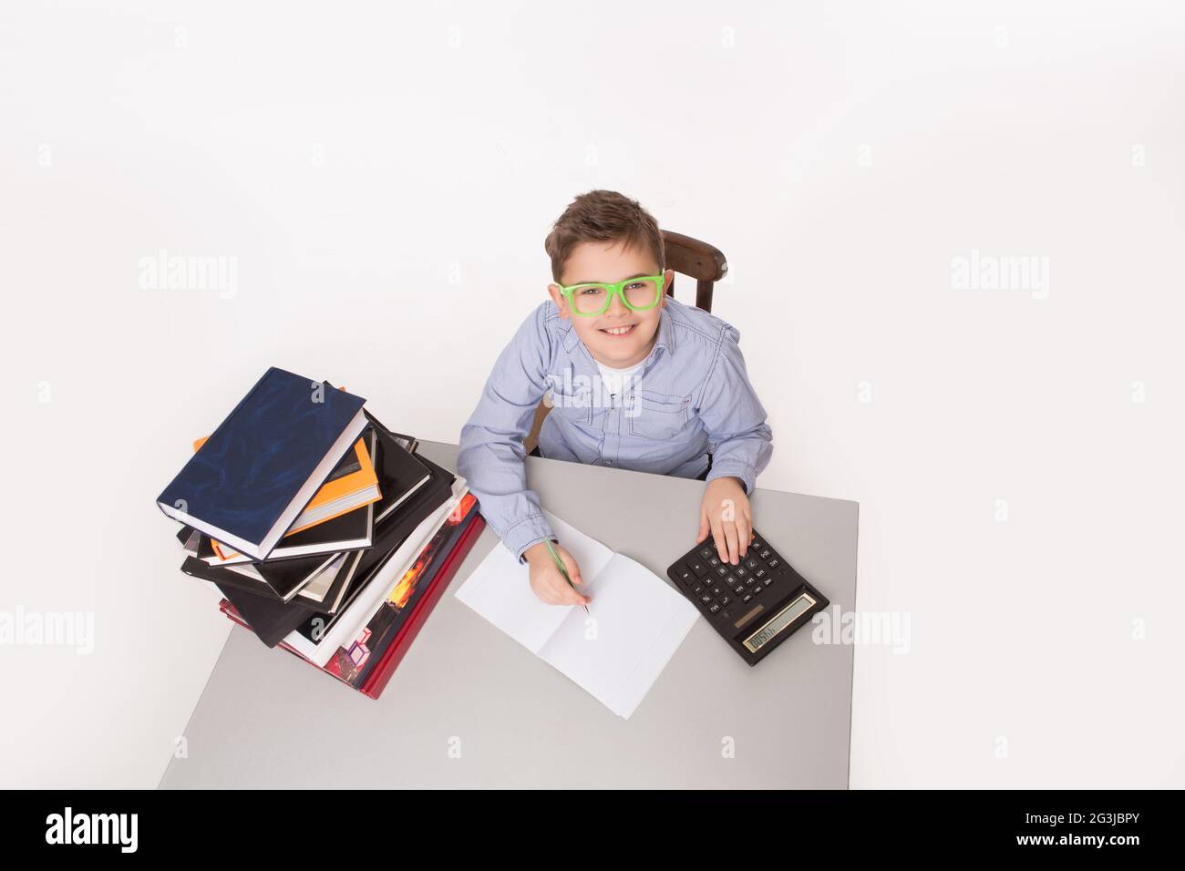 Little business boy working Stock Photo - Alamy
