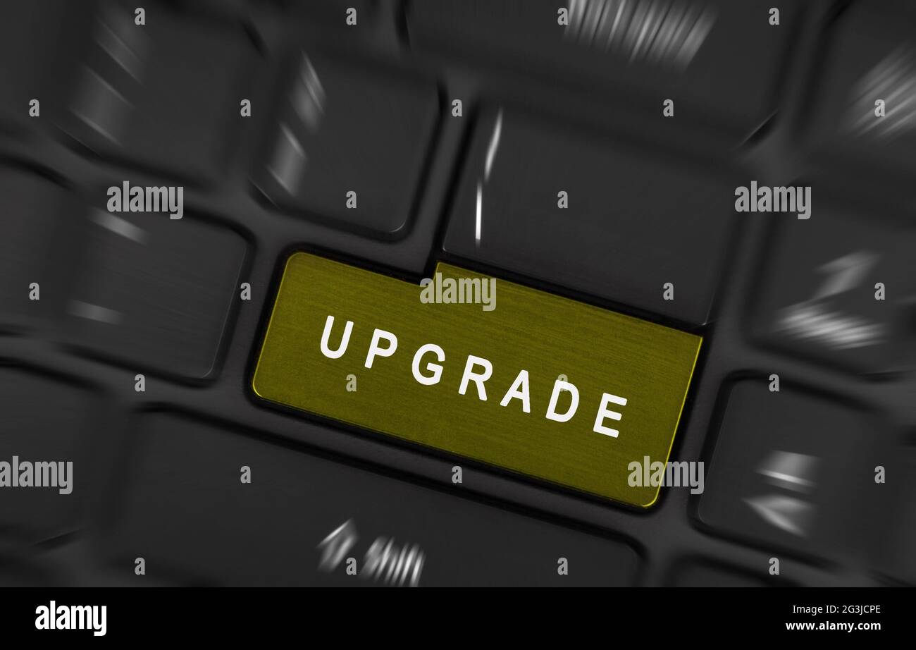 Laptop button - upgrade Stock Photo - Alamy