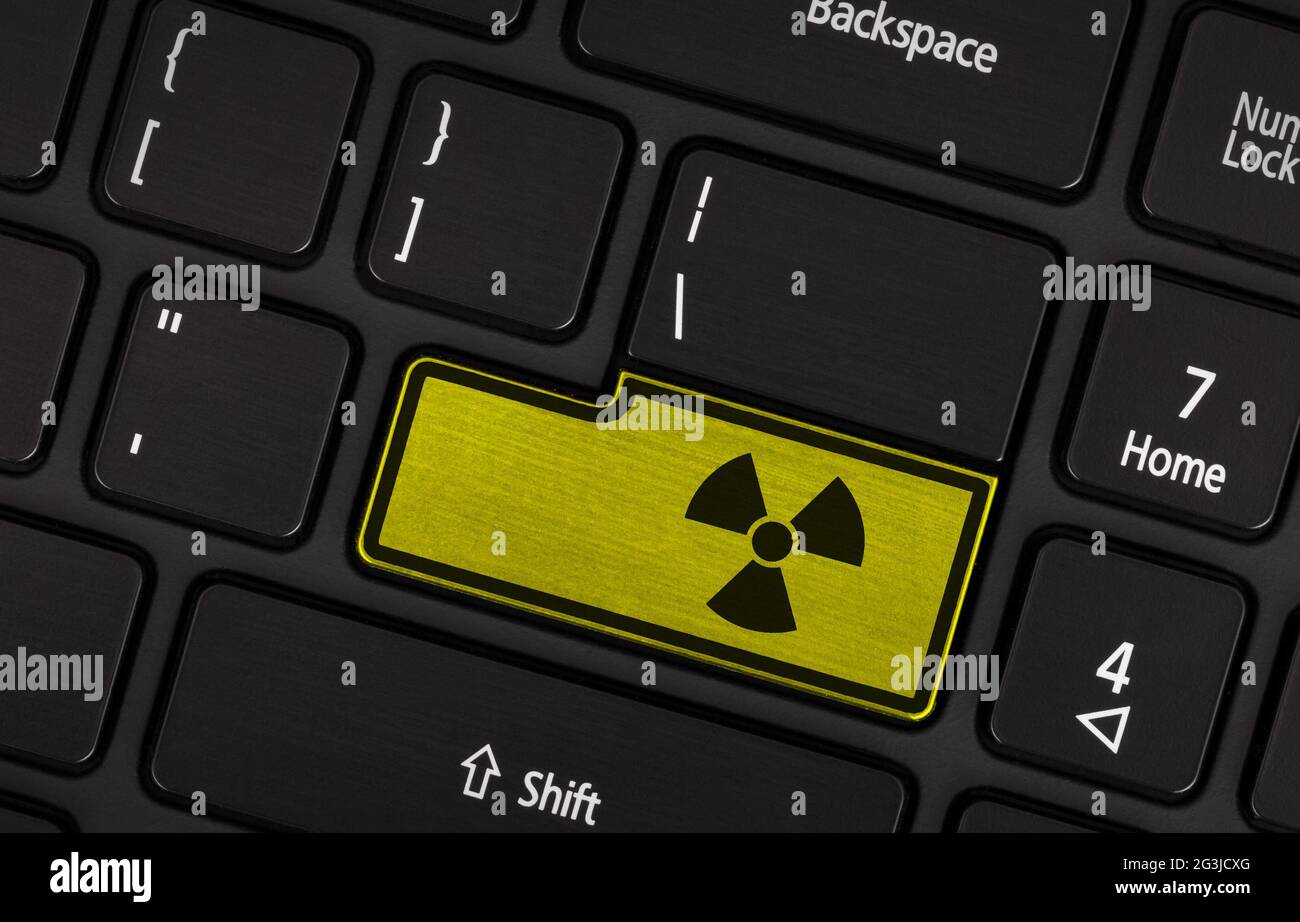 Symbol on button keyboard, radioactive Stock Photo - Alamy