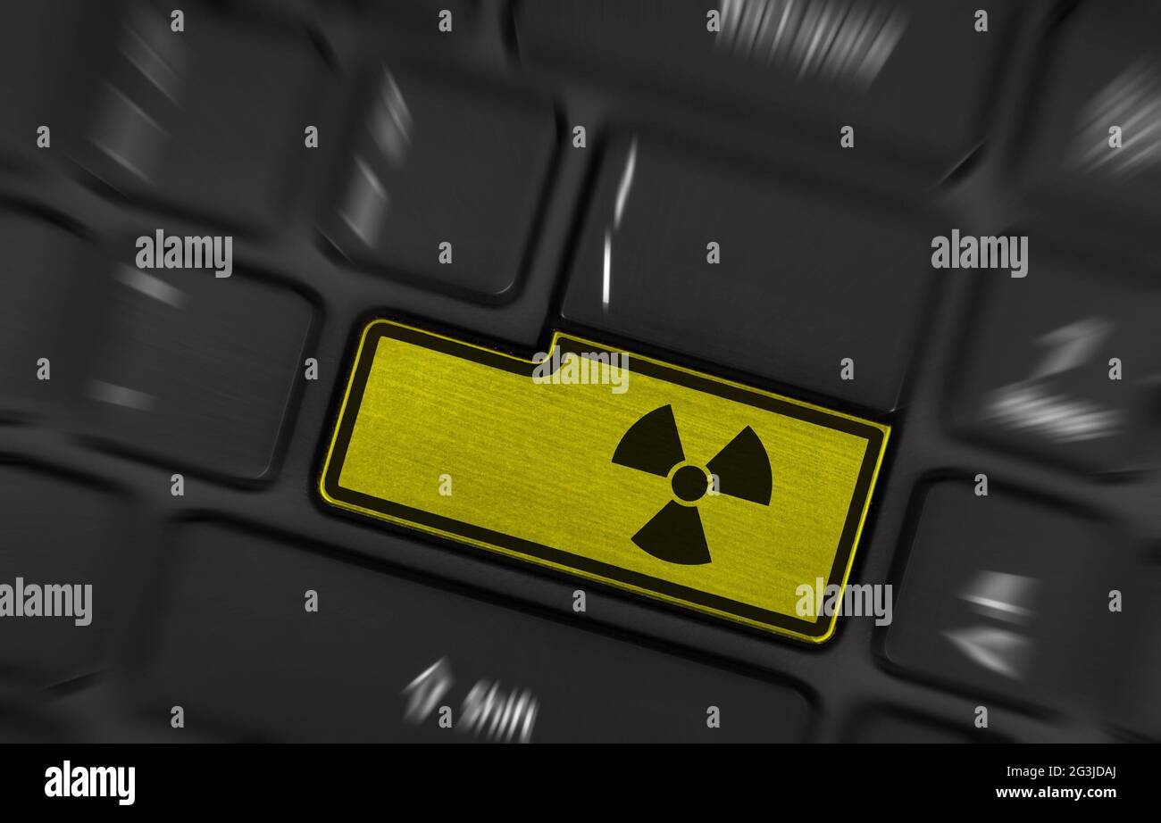 Symbol on button keyboard, radioactive Stock Photo - Alamy