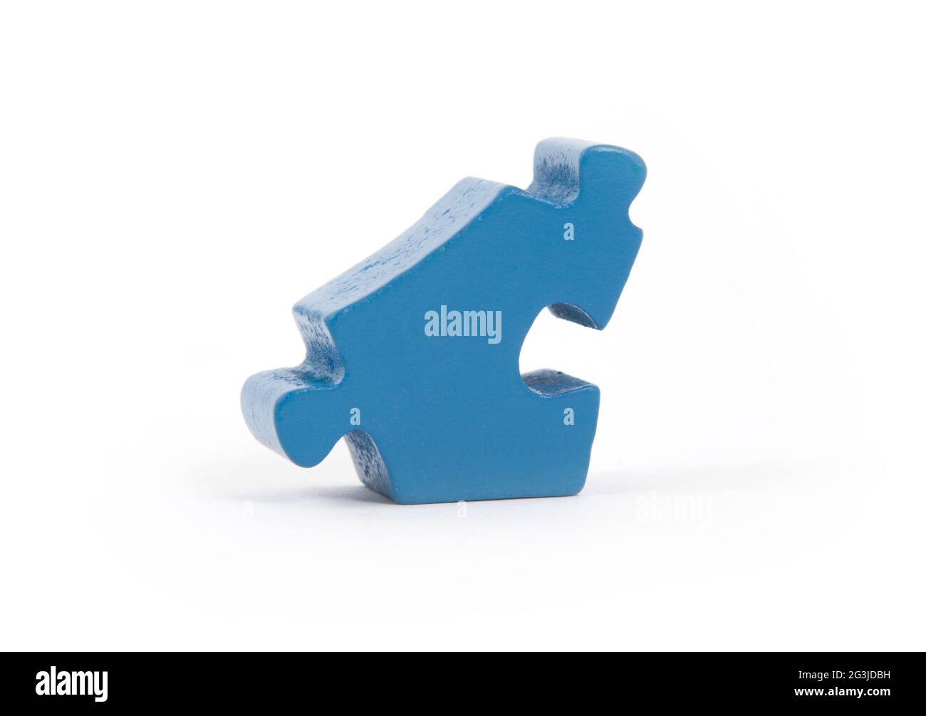 Closeup of big blue jigsaw puzzle piece Stock Photo - Alamy