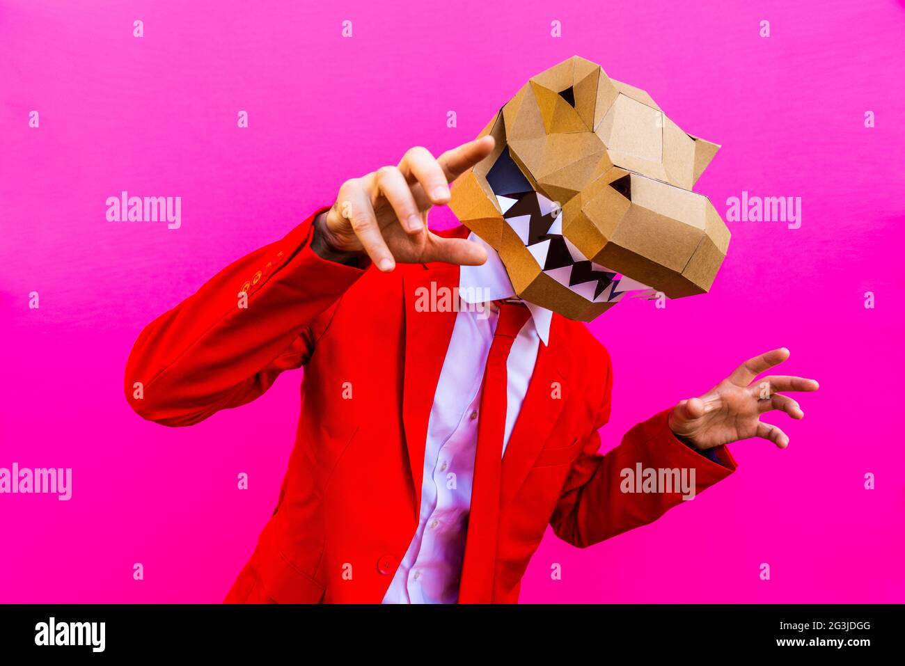 Cool man wearing 3d origami mask with stylish colored clothes ...